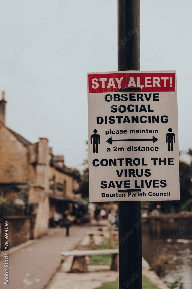 Council sign reminding residents and visitors of current social ...