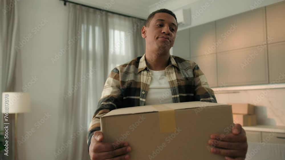 Tired displeased sad African American man home owner difficult move to ...