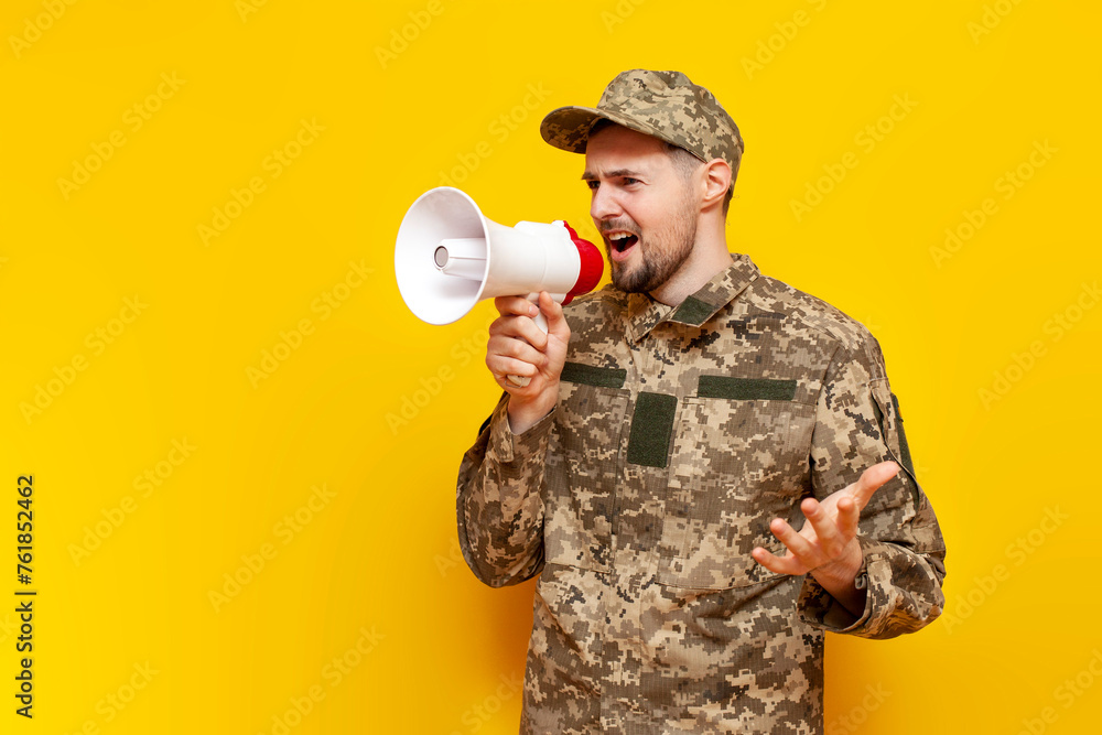 Ukrainian army soldier in pixel military camouflage uniform announces ...