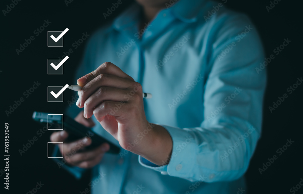 Check list concept. Businessman tick off questionnaire, survey, test ...