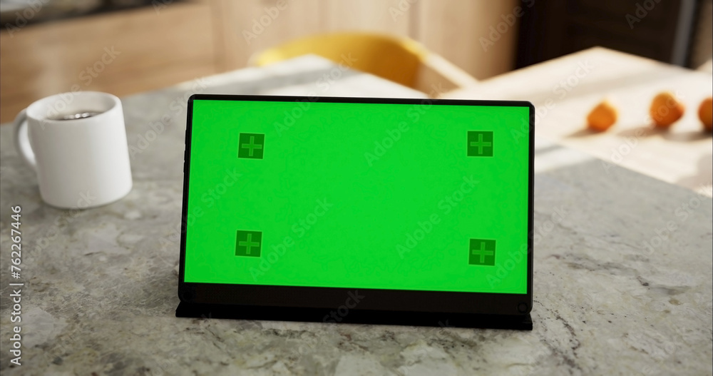 Tablet place on kitchen table, Green screen touchscreen, Close up ...