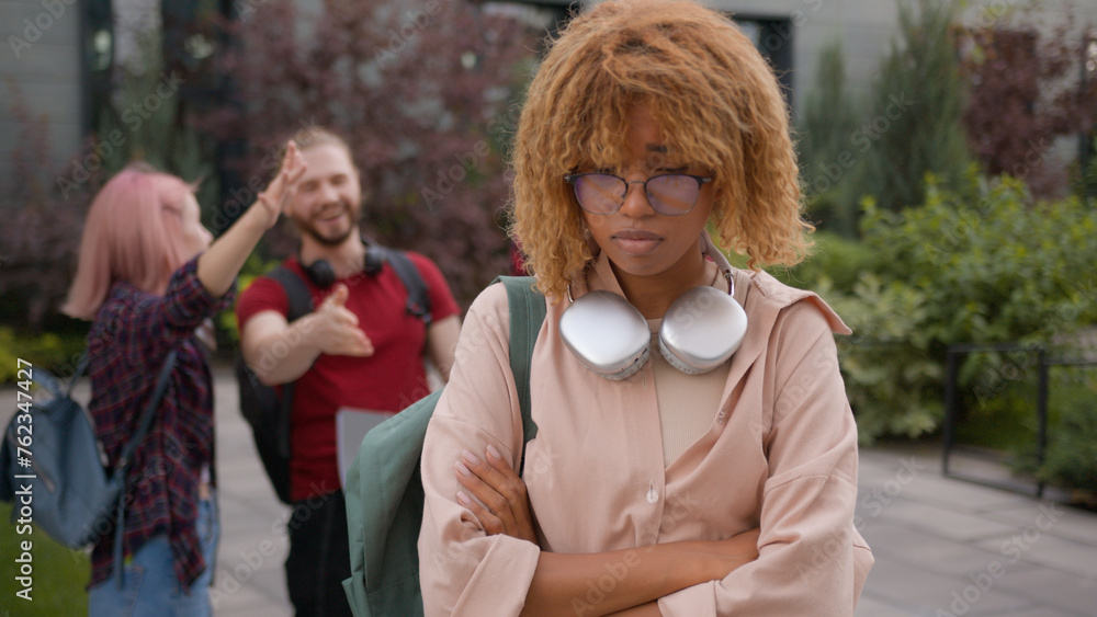 Group of angry students teenagers multiracial classmates mock humiliate ...
