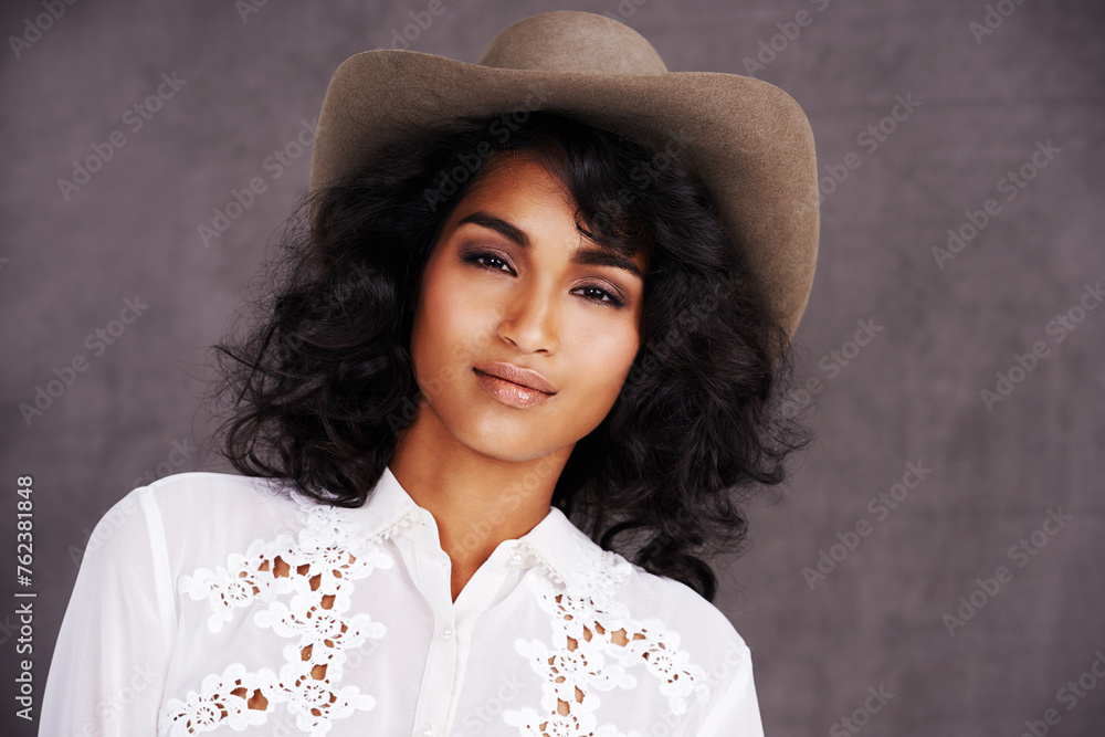 Portrait, studio and woman with cowgirl fashion, confidence and relax ...