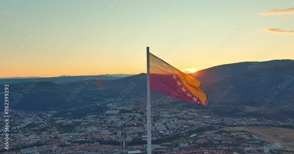 Video „Flag of Bosnia and Herzegovina Flying on the Hill Above the City ...