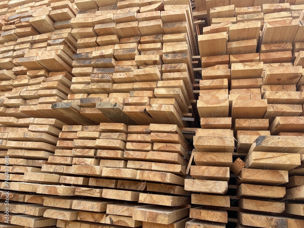 Stacked Timber Planks at a Lumberyard Awaiting Transportation. Stacked ...
