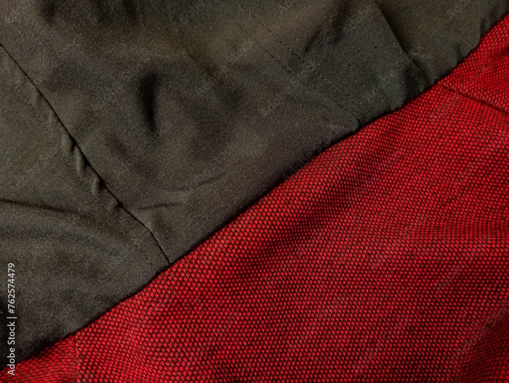 The Texture Of Two Red And Black Fabrics Sewn Together Backgrounds And