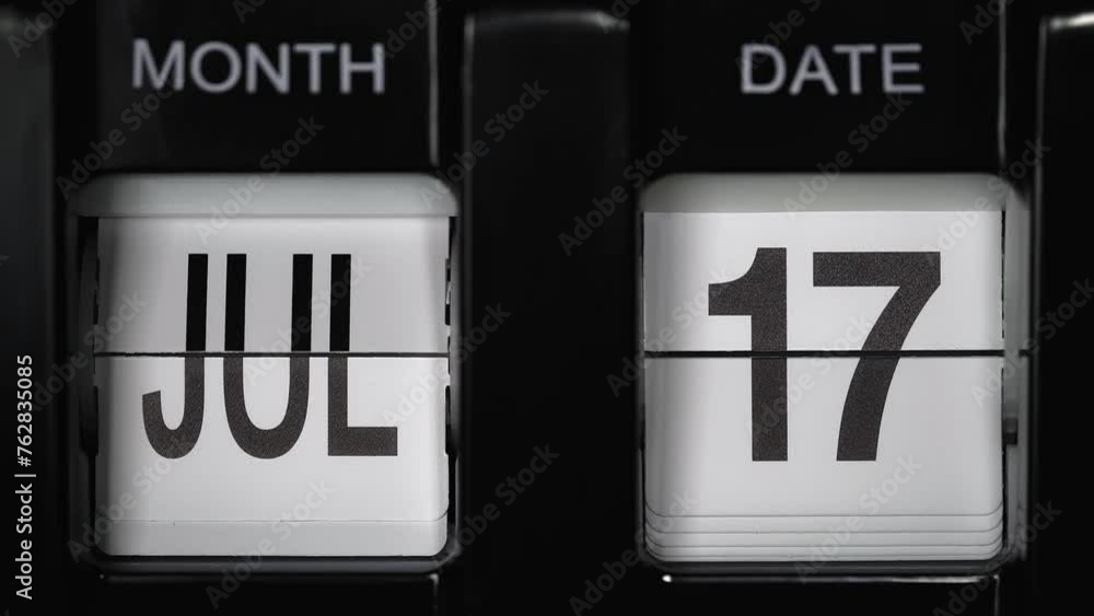 retro flip calendar with a date change from the sixteenth of July to ...