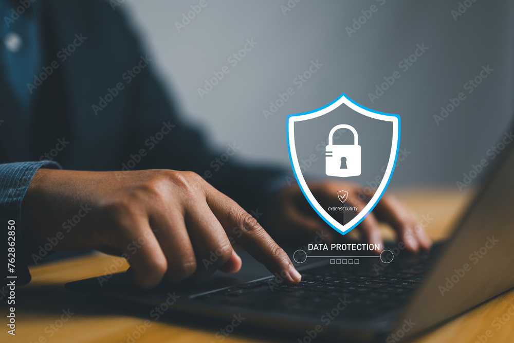 Cybersecurity data protection, businessman with security icons ...