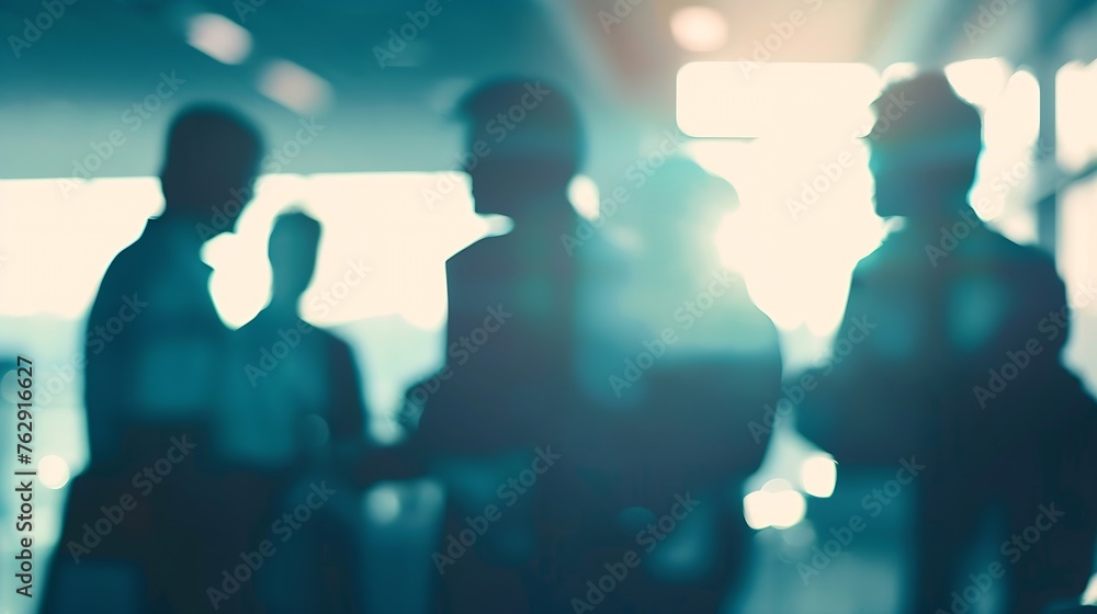 Blurred image people silhouette collaborating in office interior ...