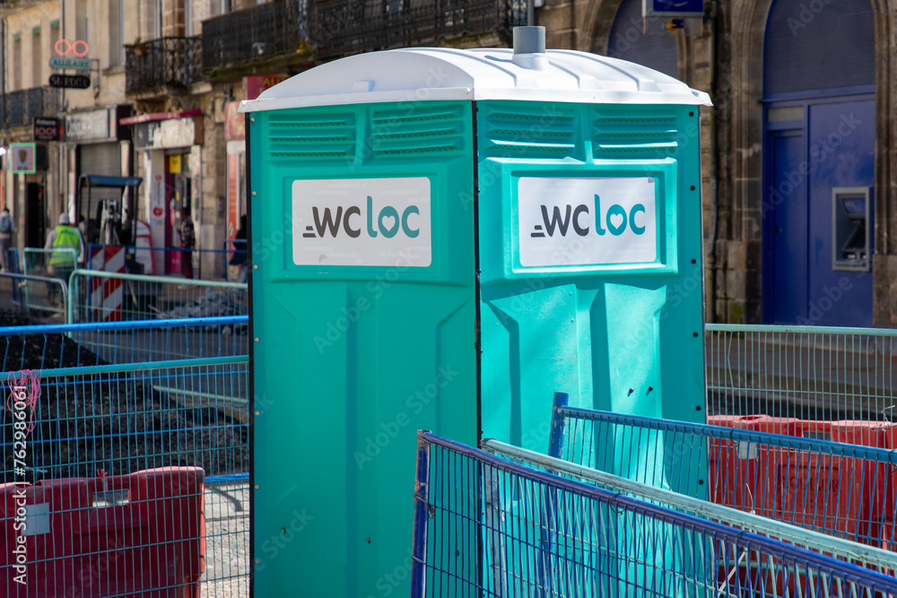 wc loc wcloc rental sign brand and text logo on green and grey porta ...