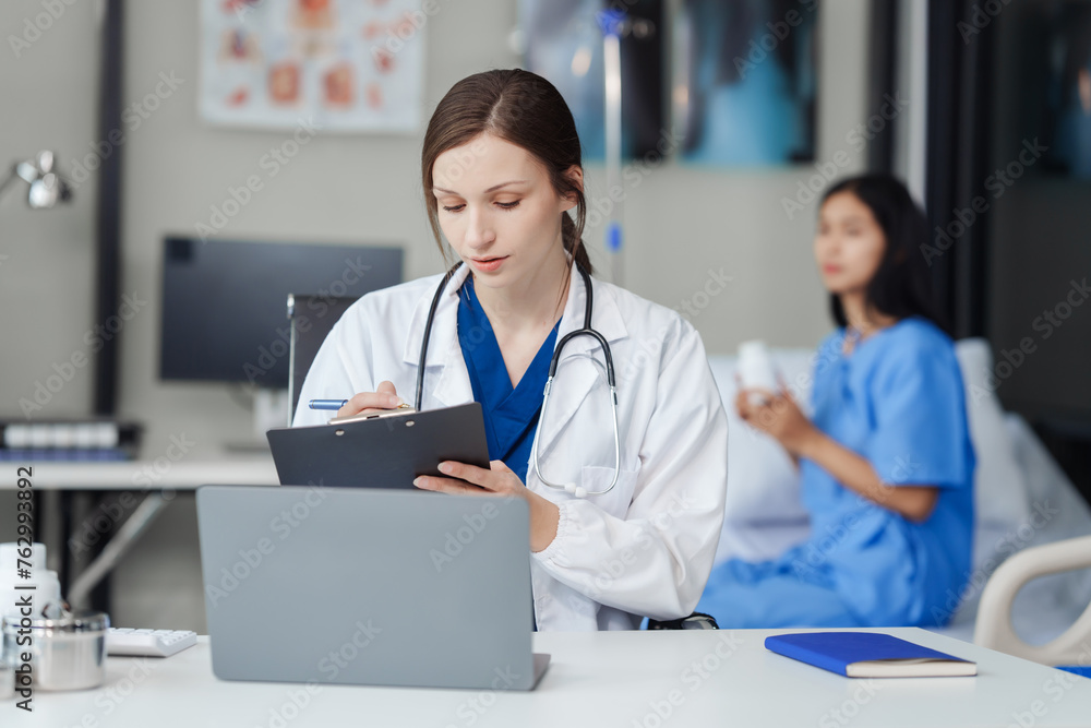 Attractive female Caucasian female doctor and psychologist gives advice ...