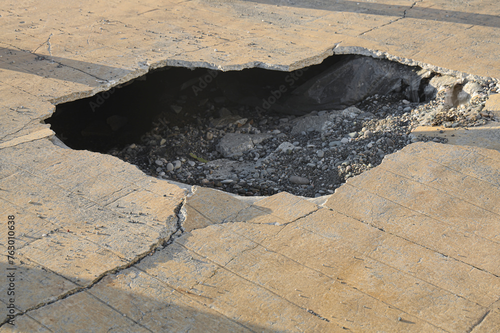 crack floor texture. Large cracks and big pit in concrete flooring ...