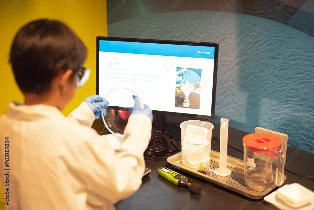 Lab computer screen showing step by step hands on experiment, Asian ...