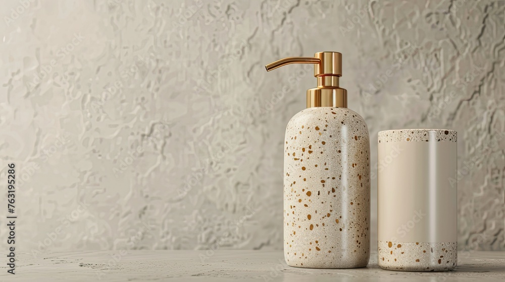 Elegant beige soap bottle with a gold pump, made of textured terrazzo ...