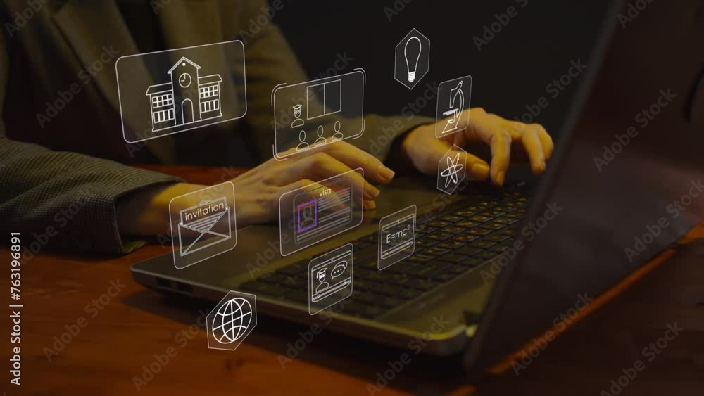 Female hands work on a laptop and on their background there are icons ...