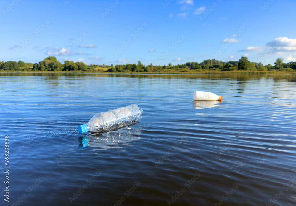 Marine plastic pollution. Plastic waste in lake. Microplastics ...