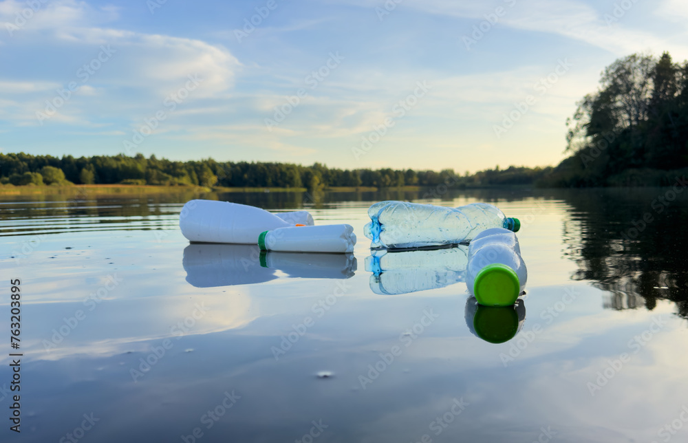 Marine plastic pollution. Plastic waste in lake. Microplastics ...