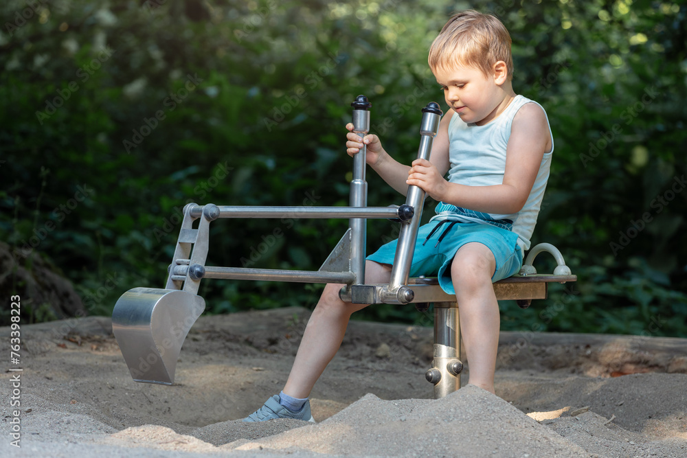 Mini excavator designed for kids that can be operated using a levers ...