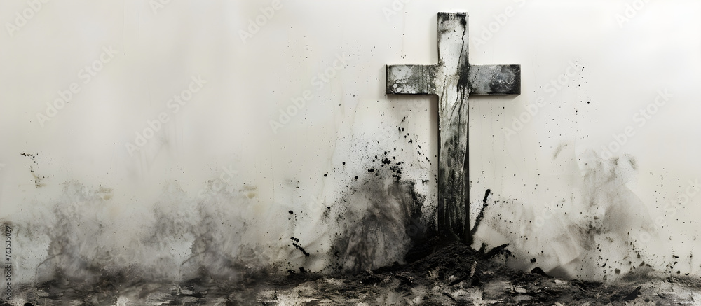 Drawing of cross in ash symbolizing religion sacrifice redemption, with ...