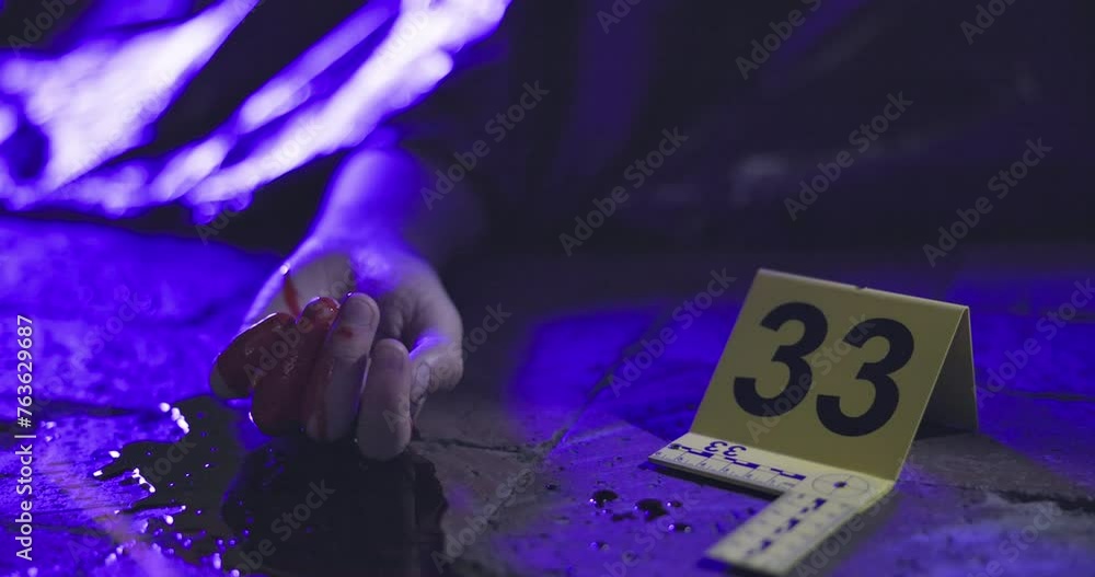 Crime scene, dead body and accident at night in street with police sign ...
