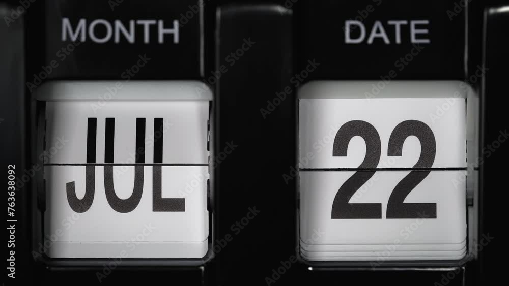 retro flip calendar with a date change from the twenty-first of July to ...