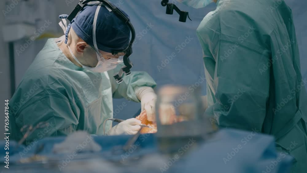 Group of surgeons men doctors physicians in medical masks process ...