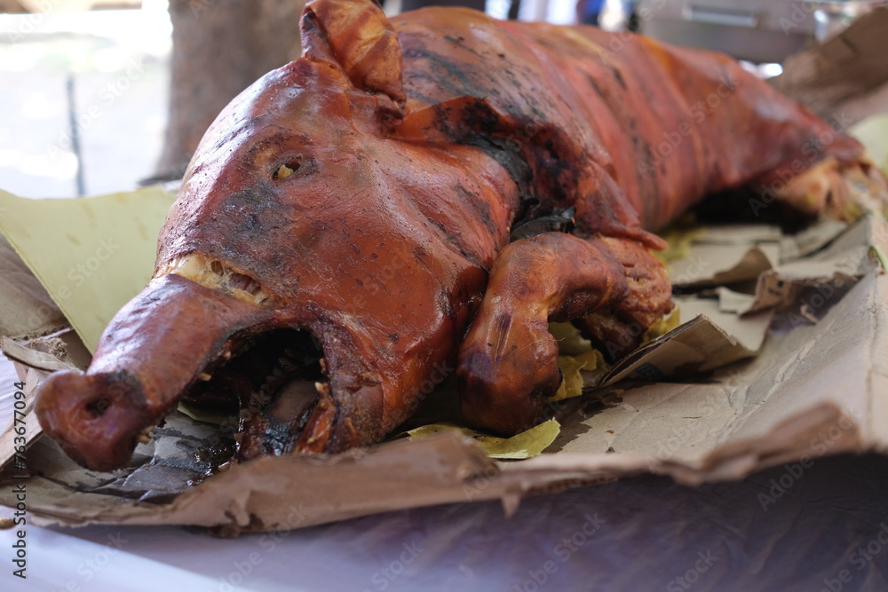 Filipino roasted pig delicacy called lechon. Stock Photo | Adobe Stock