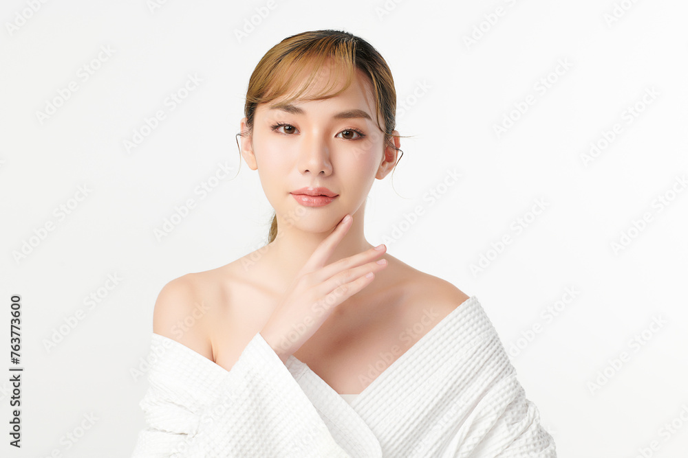Beautiful young asian woman with clean fresh skin on white background ...