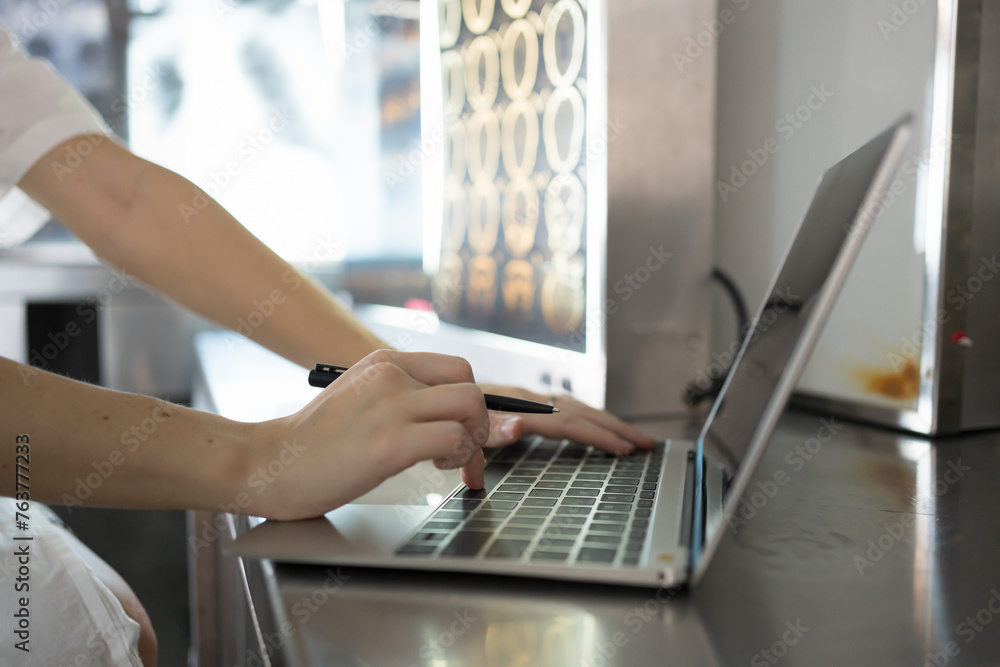 Female doctor checking anatomy and physiology x-ray film of patient in ...