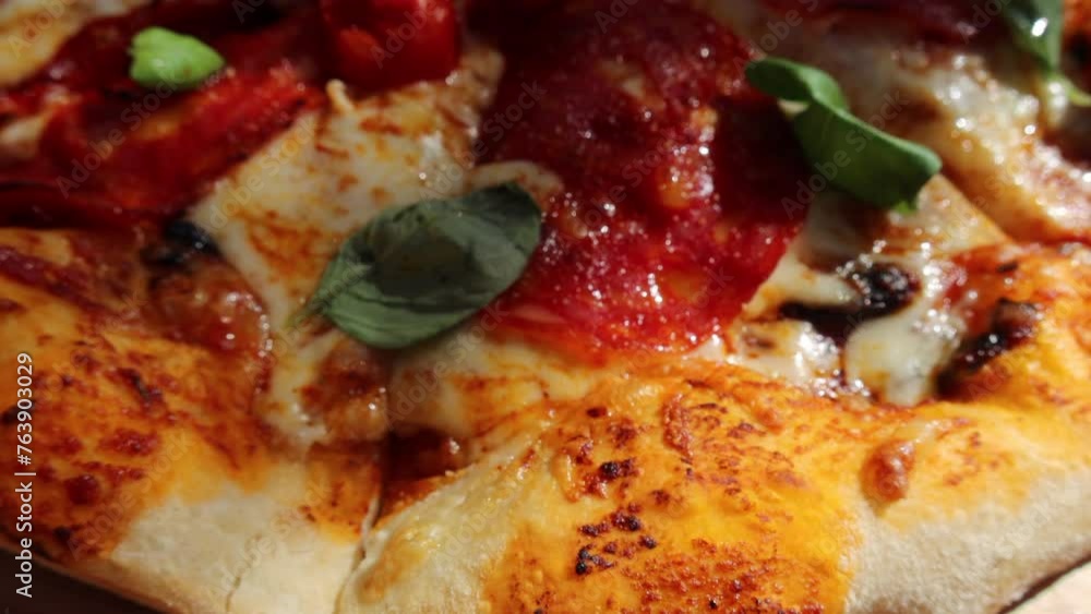 Vidéo Stock Traditional Italian spicy pepperoni pizza with cherry ...