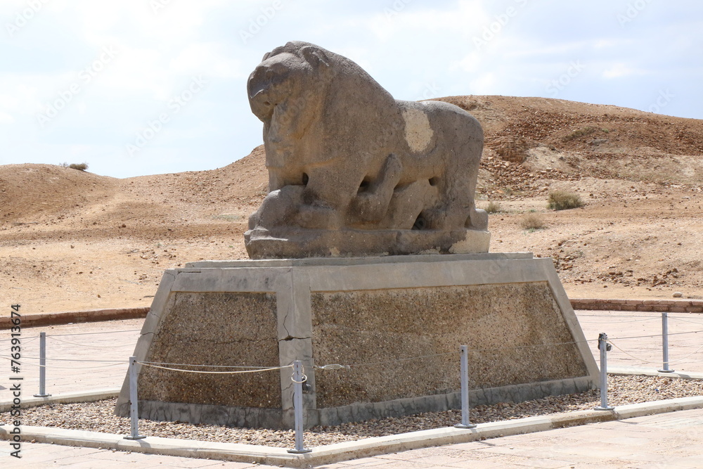 Several perspectives of the Lion of Babylon statue in the ancient city ...