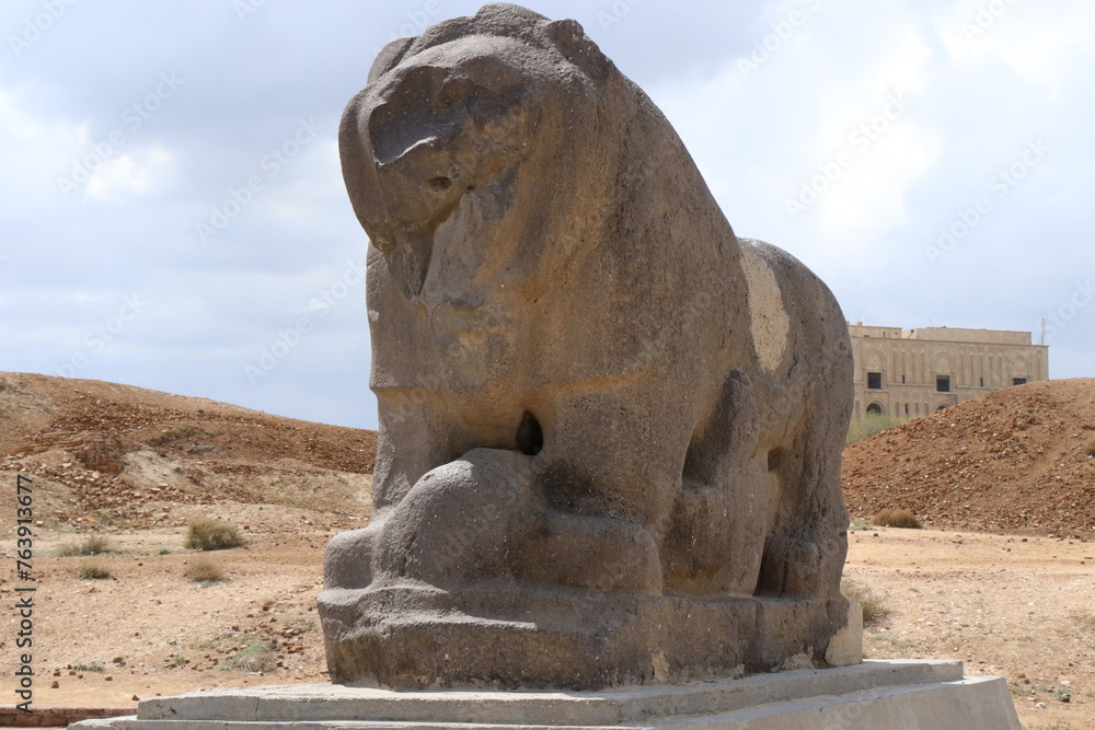 Several perspectives of the Lion of Babylon statue in the ancient city ...