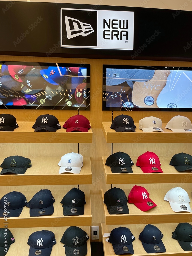 Official New Era brand products in store in shopping mall. New Era Cap ...