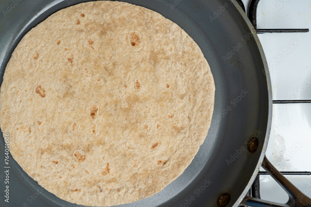 Round Indian flat bread, roti or chapati made from unleavened dough ...