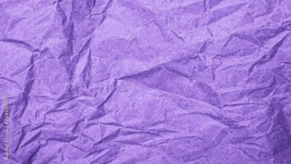 Video background of purple crumbled paper. Video Top view of wrinkled ...