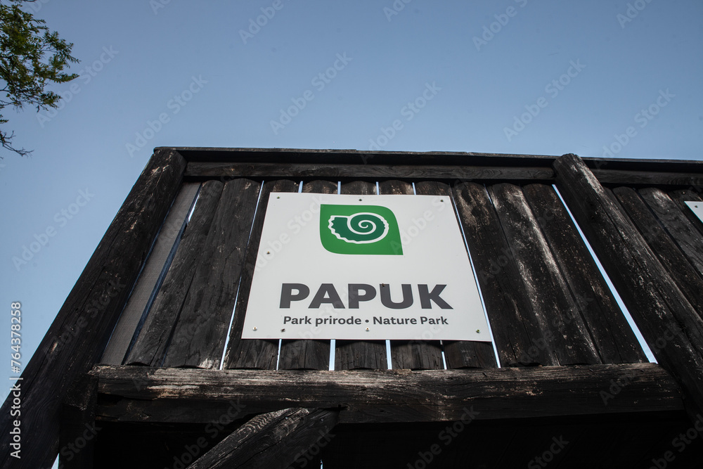 PAPUK, CROATIA - SEPTEMBER 14, 2023:Logo of Papuk Nature Park in front ...