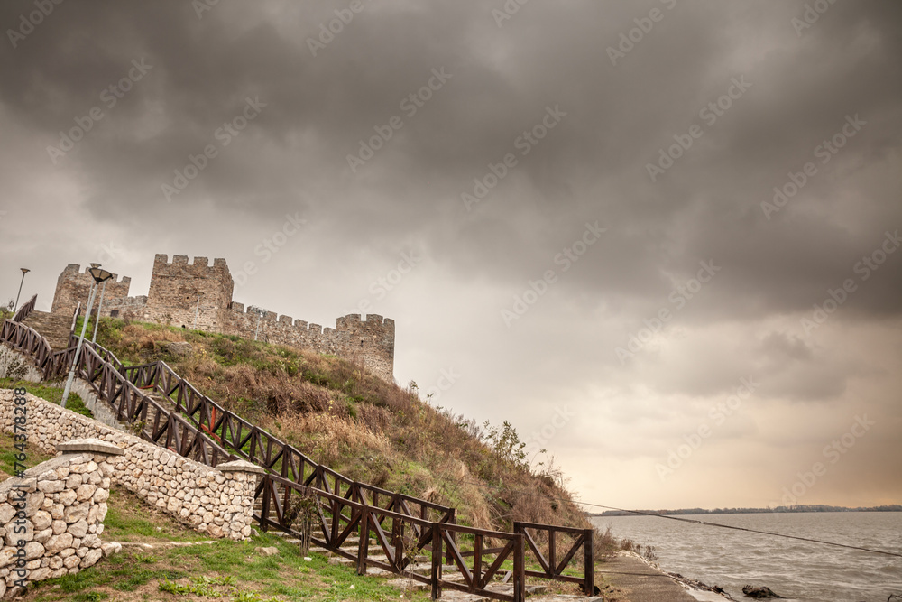 Panorama of the Ram fortress during a cloudy dusk sunset in winter over ...