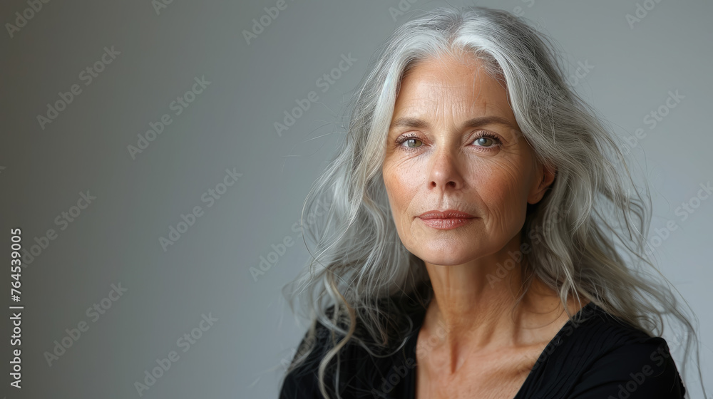 beautiful smiling elderly woman with gray hair on white background ...