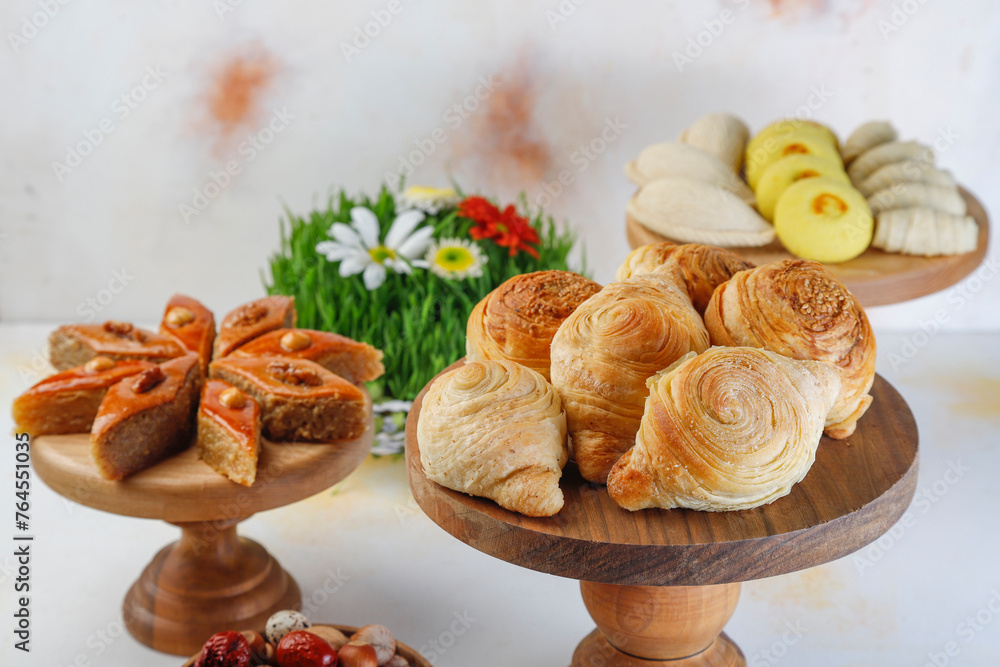 Traditional Azerbaijan holiday Novruz background with green semeni ...