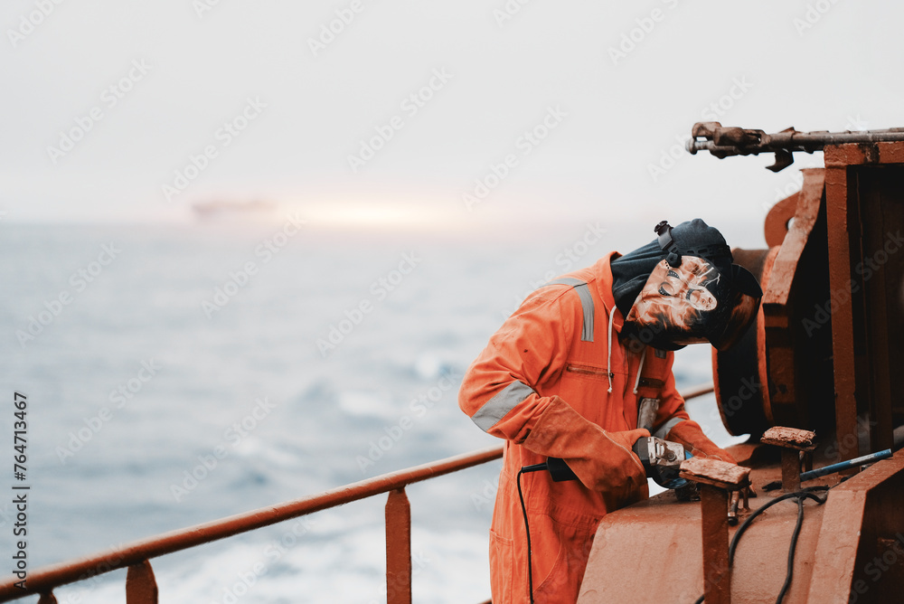 Seaman Seafarer Welder In Safety Protective Clothes Working With ...