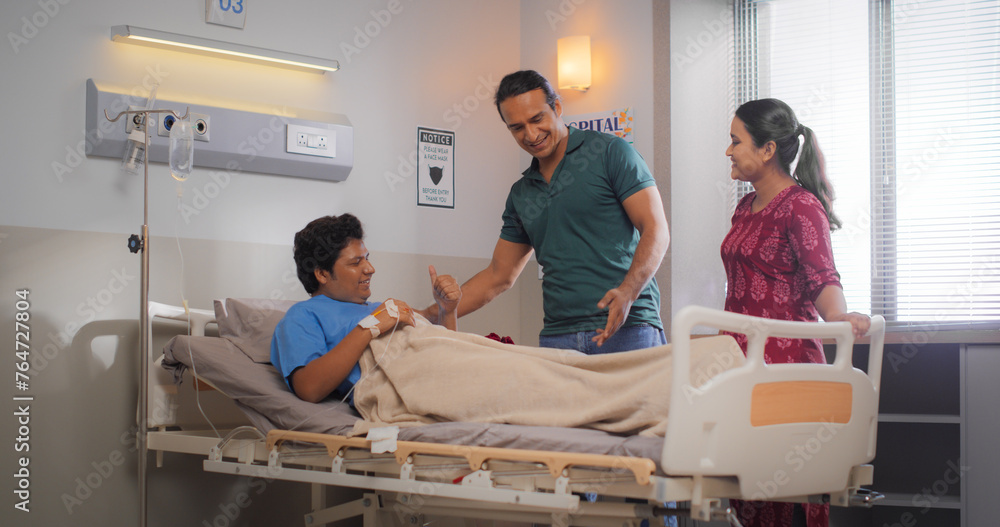 Poster Portrait of Young Indian Couple Visiting Their Friend After his ...