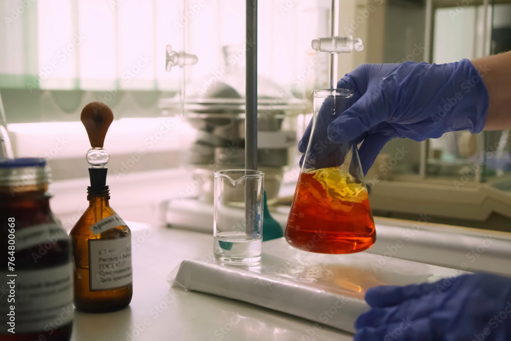 Test tubes and flasks with multi colored liquids in the laboratory ...