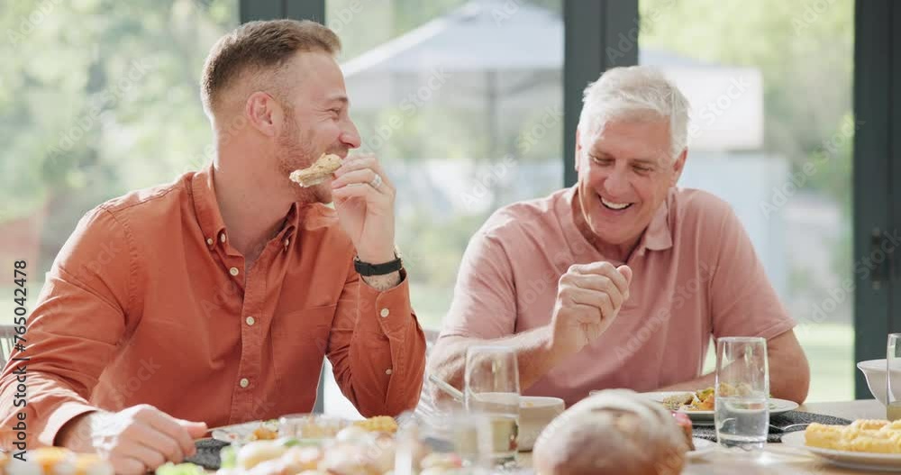 Senior, man and son with laughing while eating in dining room of home ...