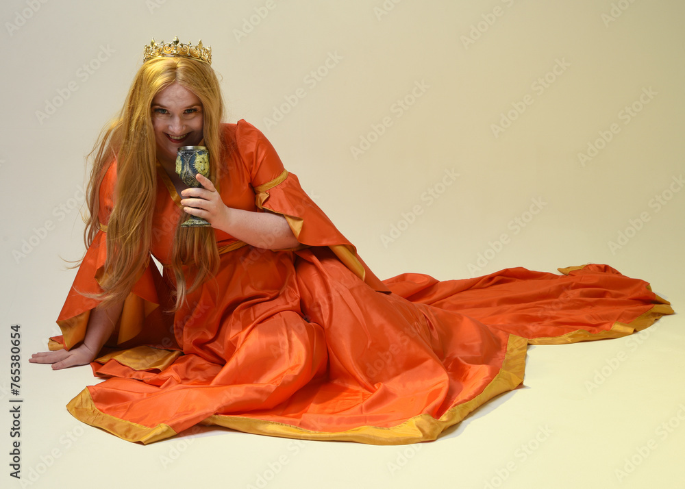 Full Length Portrait Of Plus Size Blonde Woman Wearing Historical