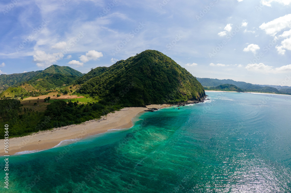 Exploring the Coastal Majesty: Aerial Views of Pantai Serangan Beach on ...