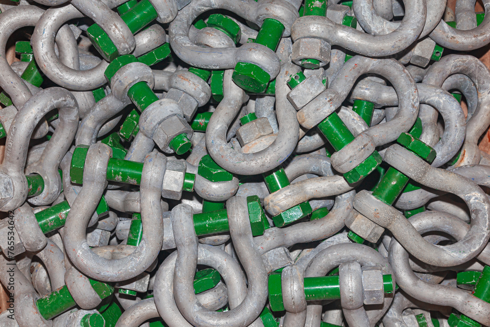 Lots of new cargo rigging shackles. Stock Photo | Adobe Stock