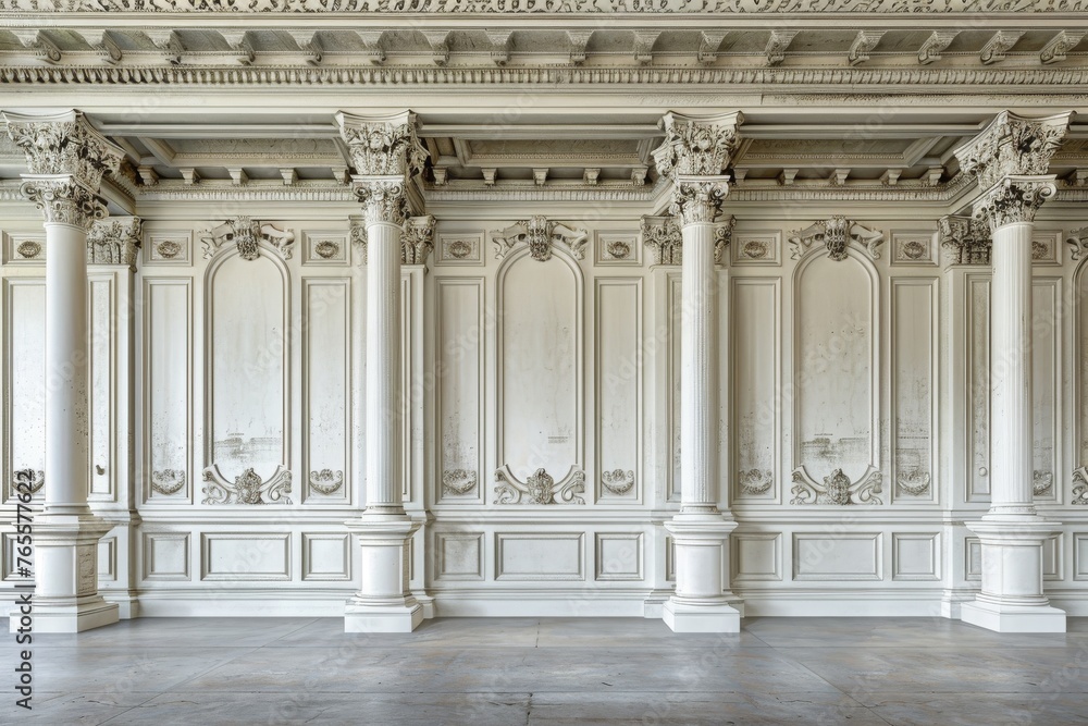 Classic white columned wall with intricate paneling and crown moldings ...