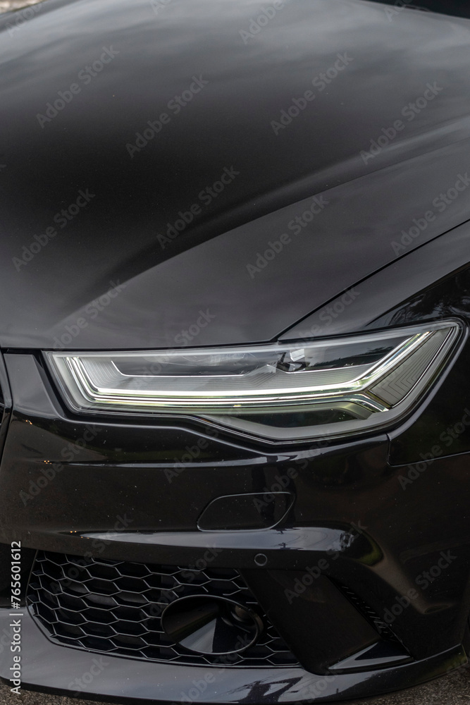 Black Audi RS6 Avant headlight focused shot, top down view - High ...