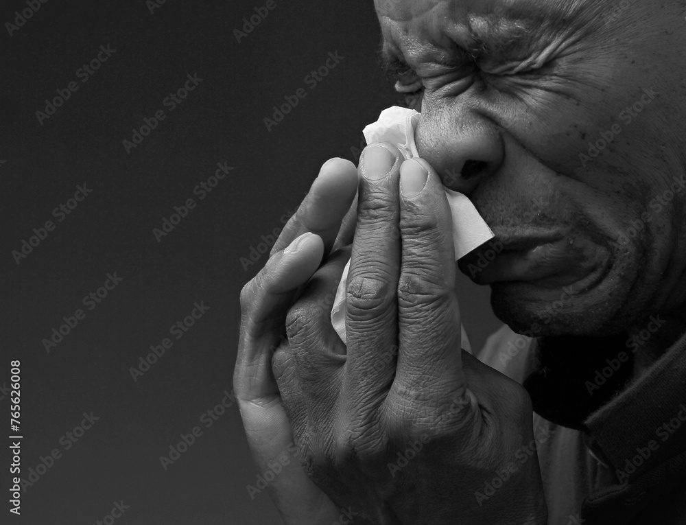 man catching the cold and flu man blowing nose after catching a cold ...