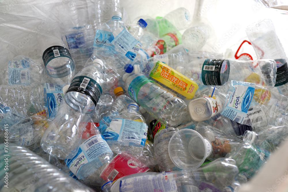 PENANG, MALAYSIA - 14 JUL 2023: A significant pile of plastic bottles ...